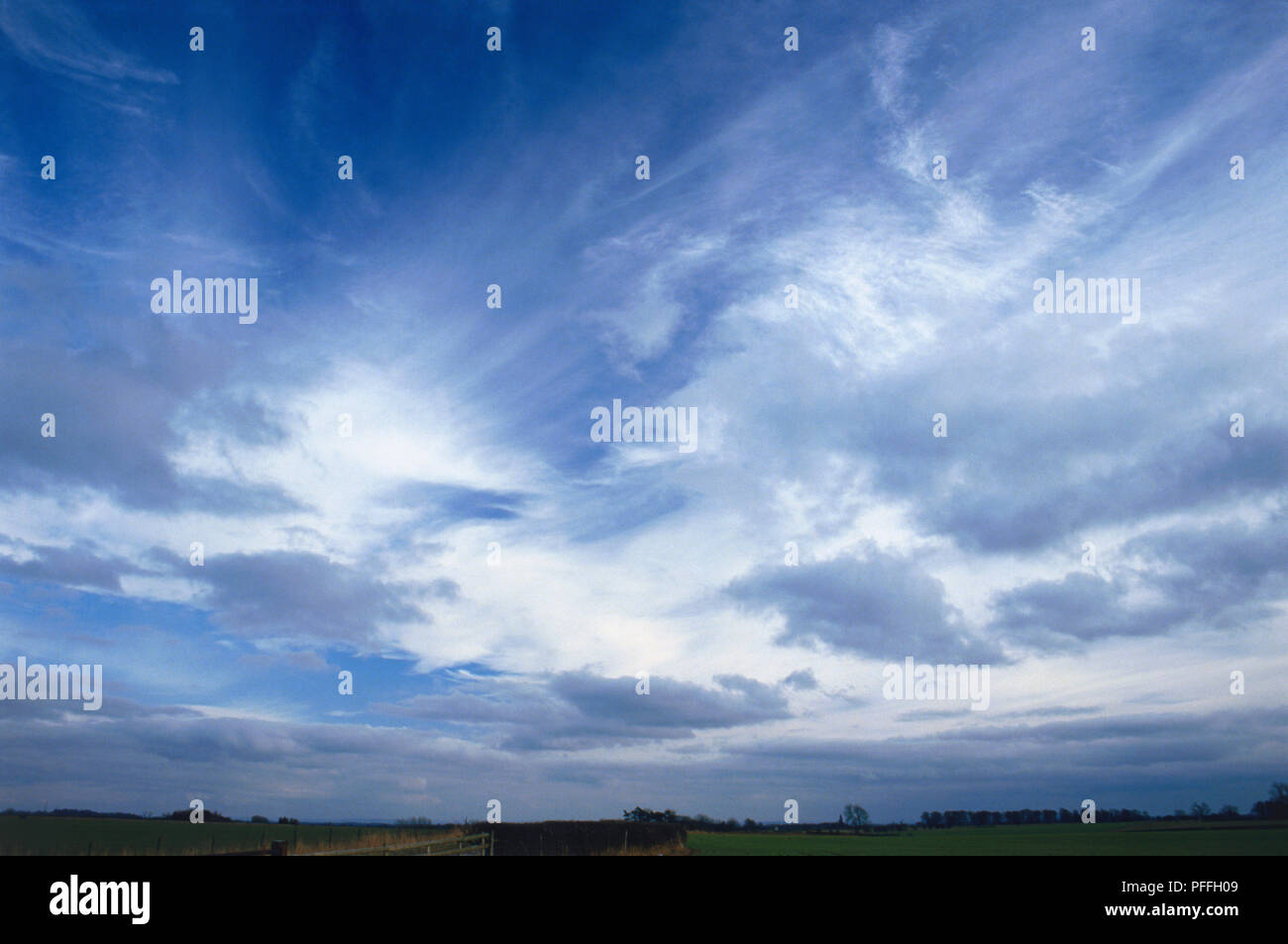 Stratocumulus, white and grey clouds characterised by large dark ...