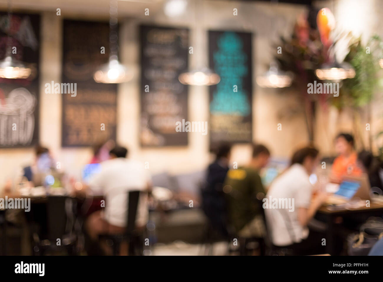 Education concept on blurred students doing home work Stock Photo - Alamy