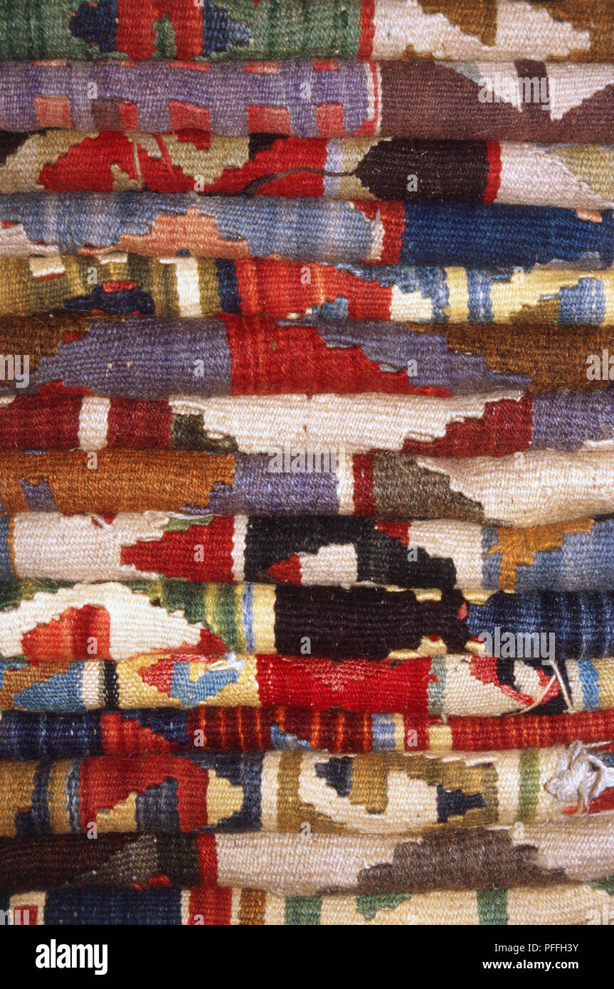 Turkey, Istanbul, close-up of Turkish carpets piled up for sale at ...