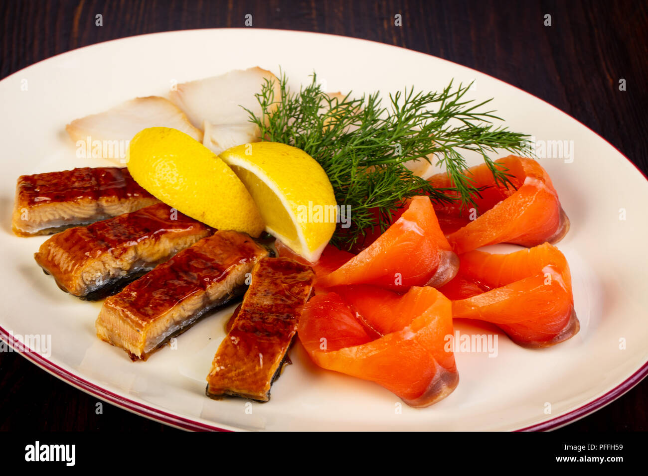 Fish plate with eel and salmon Stock Photo - Alamy