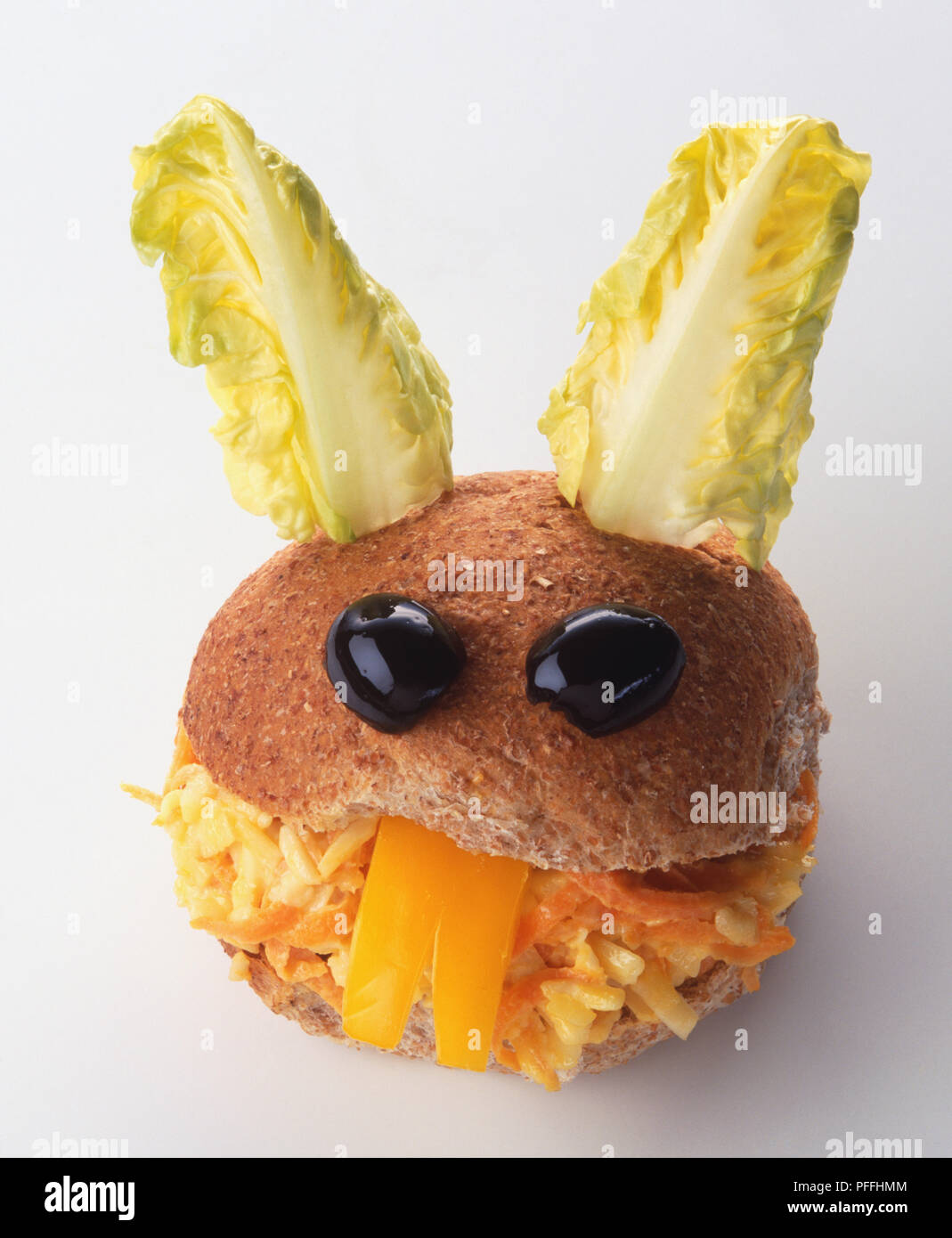 Bread roll and salad in the shape of a rabbit Stock Photo - Alamy