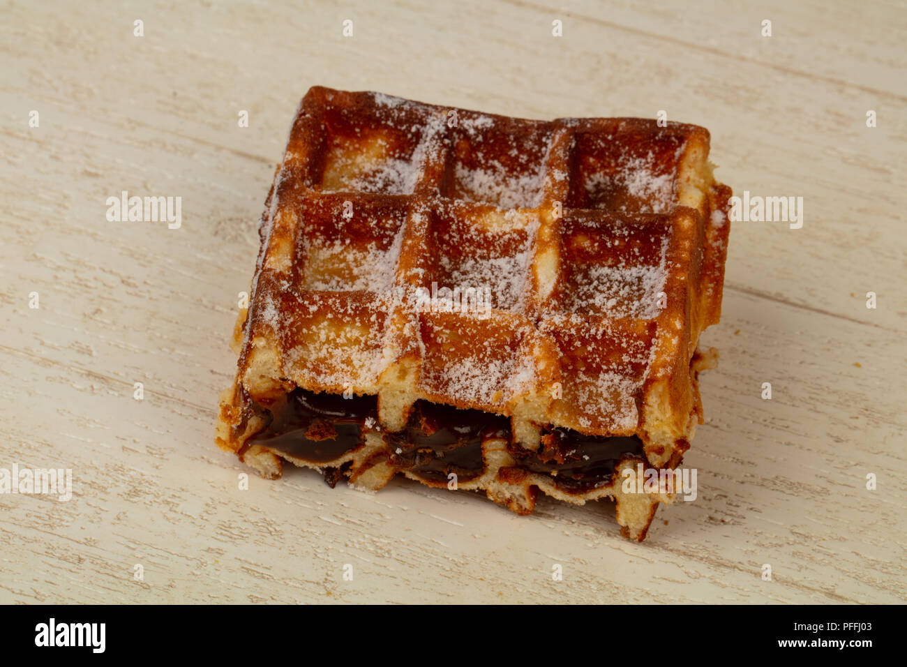 Sweet Waffle with berry jam Stock Photo - Alamy