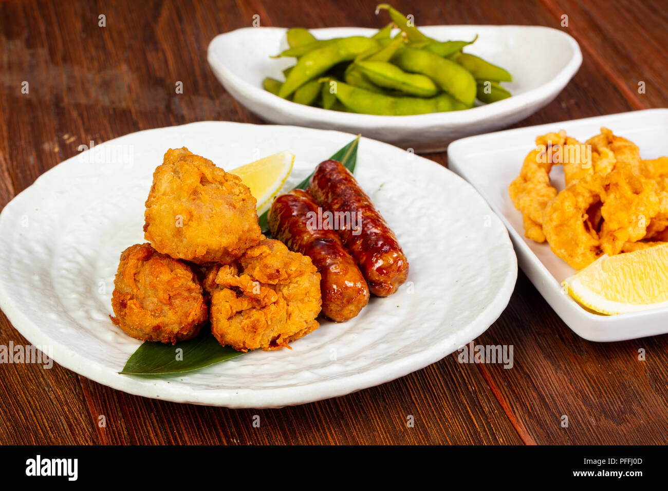 Sausage and chicken nuggets with green bean Stock Photo - Alamy