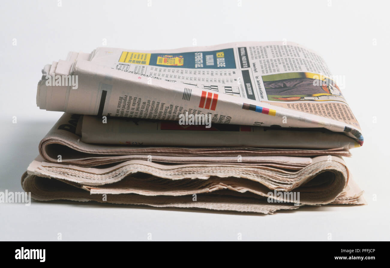 Folded newspapers hi-res stock photography and images - Alamy