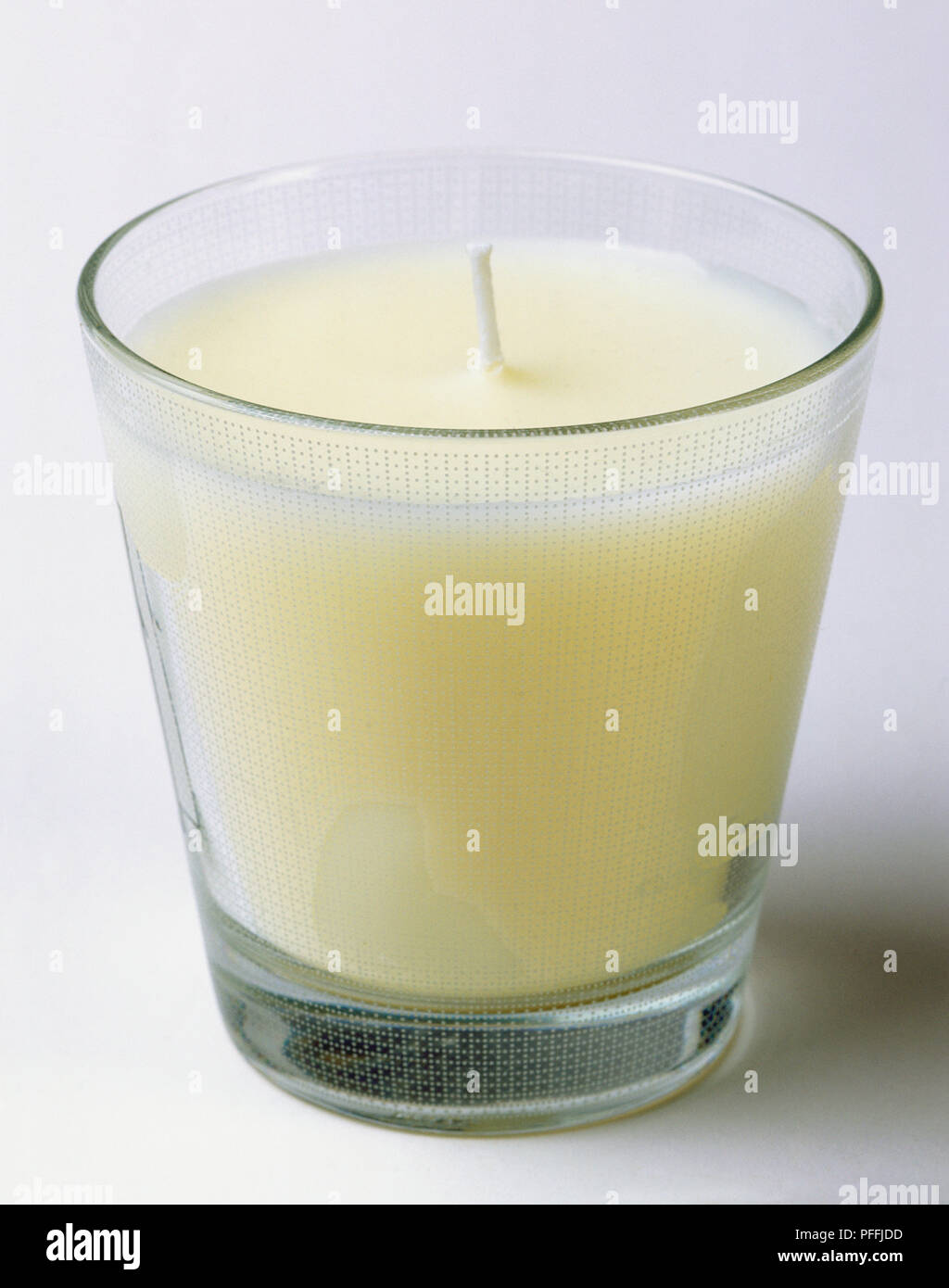 Scented candle in a glass holder, unlit wick, angled front view Stock ...