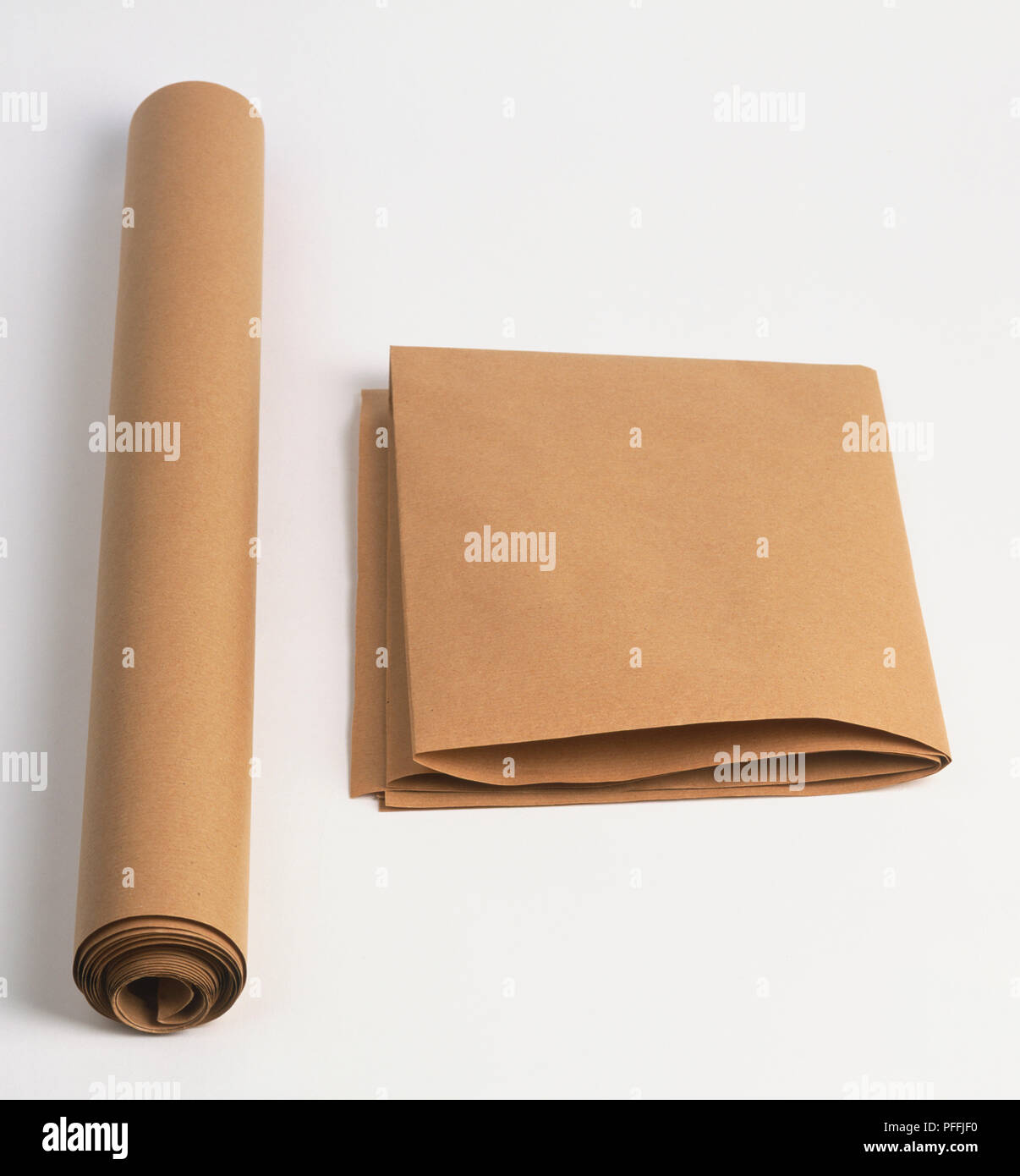 Brown parcel paper, roll of paper, and folded paper Stock Photo - Alamy