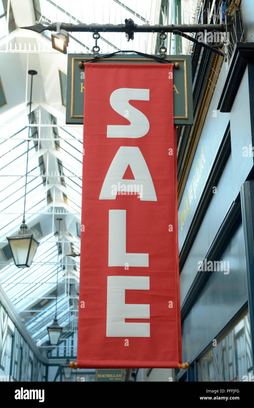 Sale signs outside shop Stock Photo - Alamy