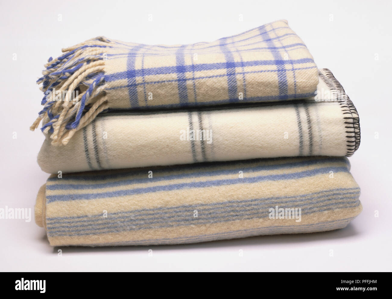 Three striped blankets folded and stacked in a pile, front view Stock ...