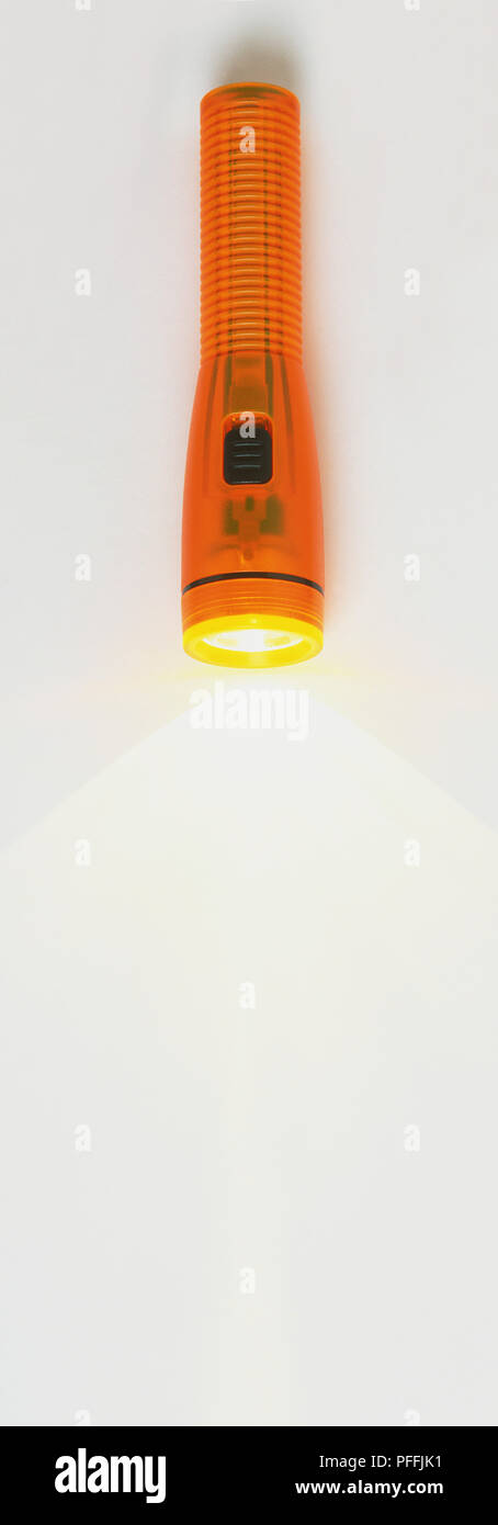 Lit orange torch, side view Stock Photo - Alamy