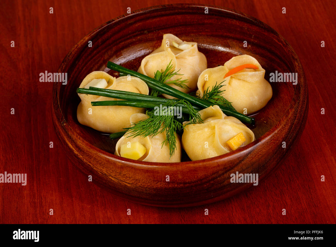 Uzbek traditional dumplings - Manti with meat Stock Photo - Alamy