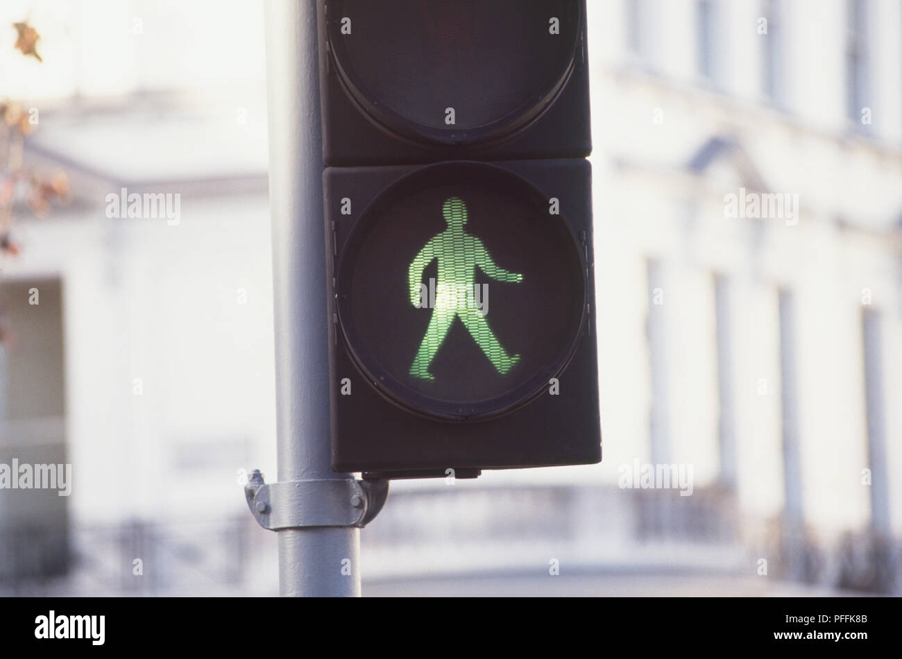 England, London, 'walking man' green light on a pedestrian crossing ...