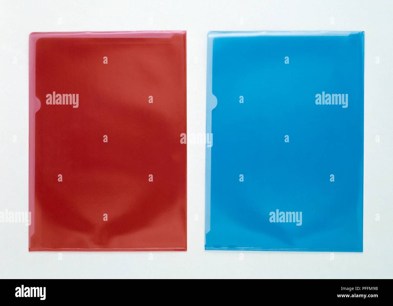 Red and blue plastic file folders Stock Photo - Alamy