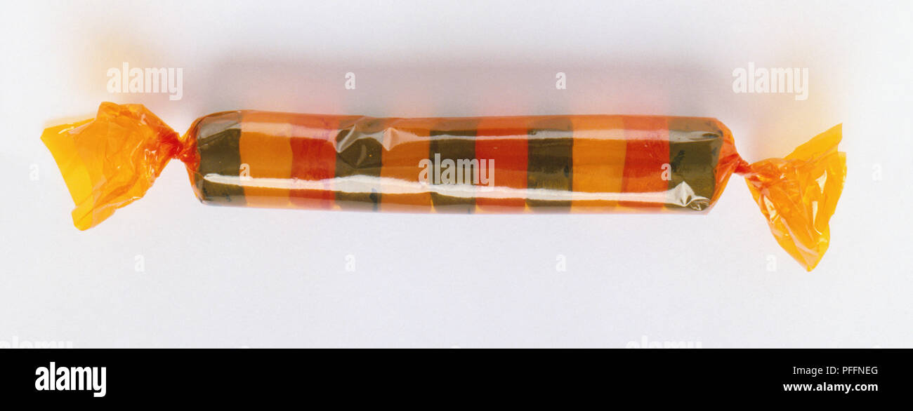 Packet of colourful, round sweets wrapped in clear cellophane Stock ...