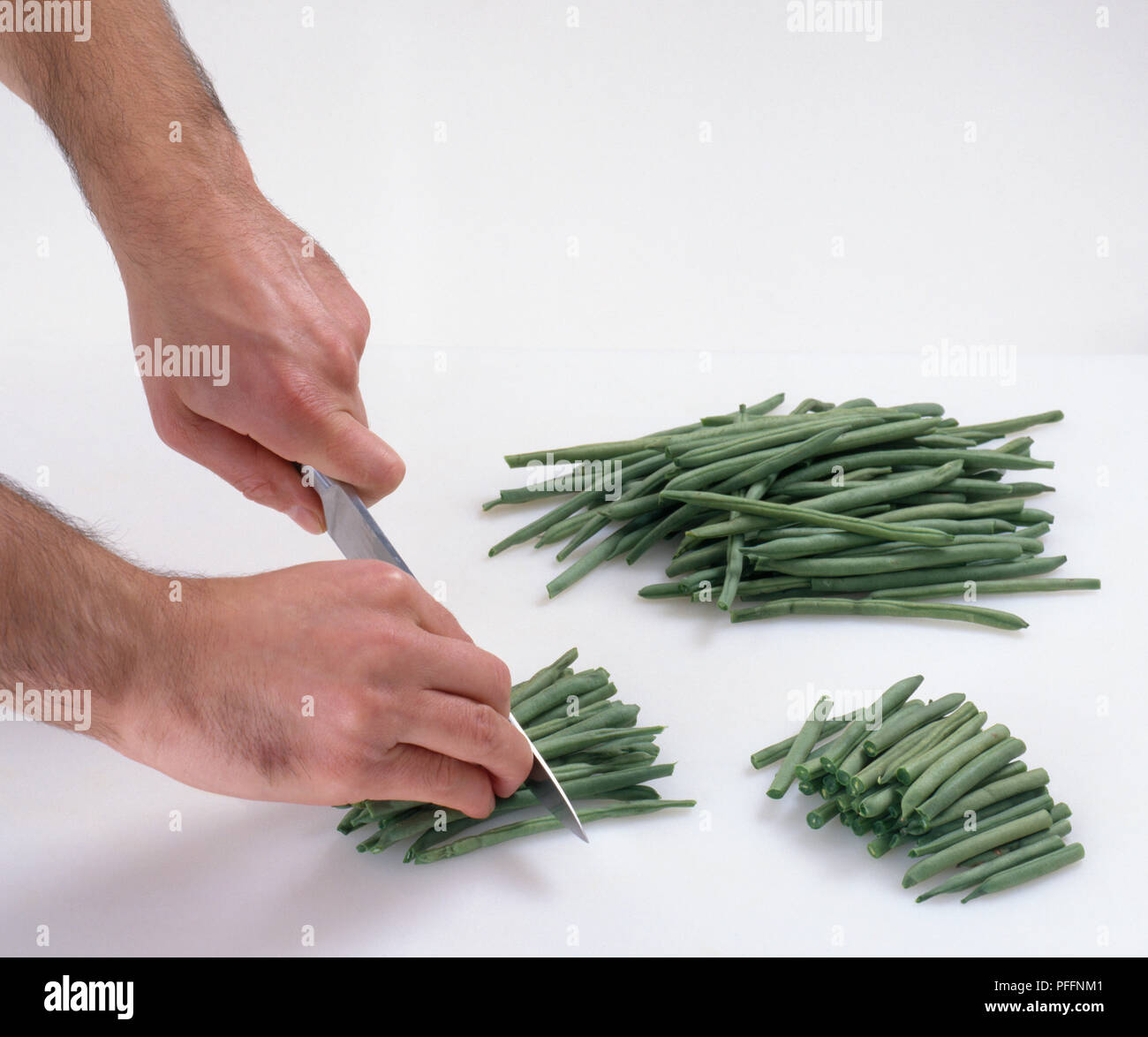 White french beans in hand hi-res stock photography and images - Alamy