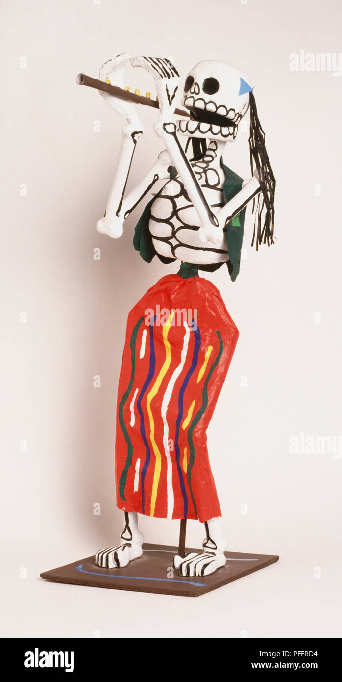 Mexican day of the dead papier mache figurine of skeleton playing ...