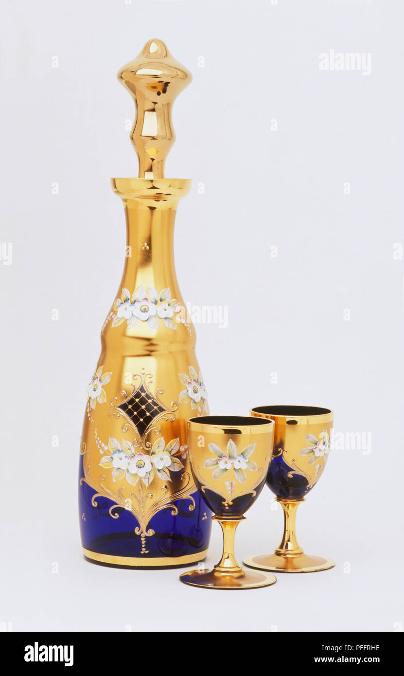 Czech blue and gold decorated decanter and glasses, front view Stock ...