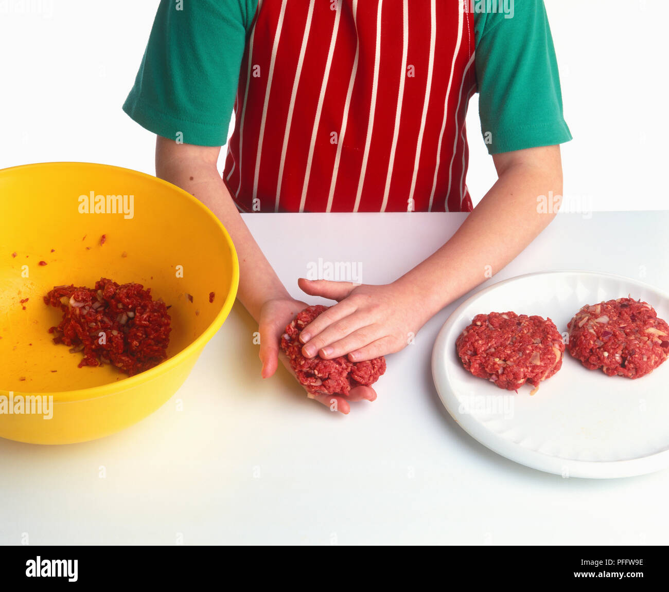 Beef hamburger holding human hi-res stock photography and images - Alamy