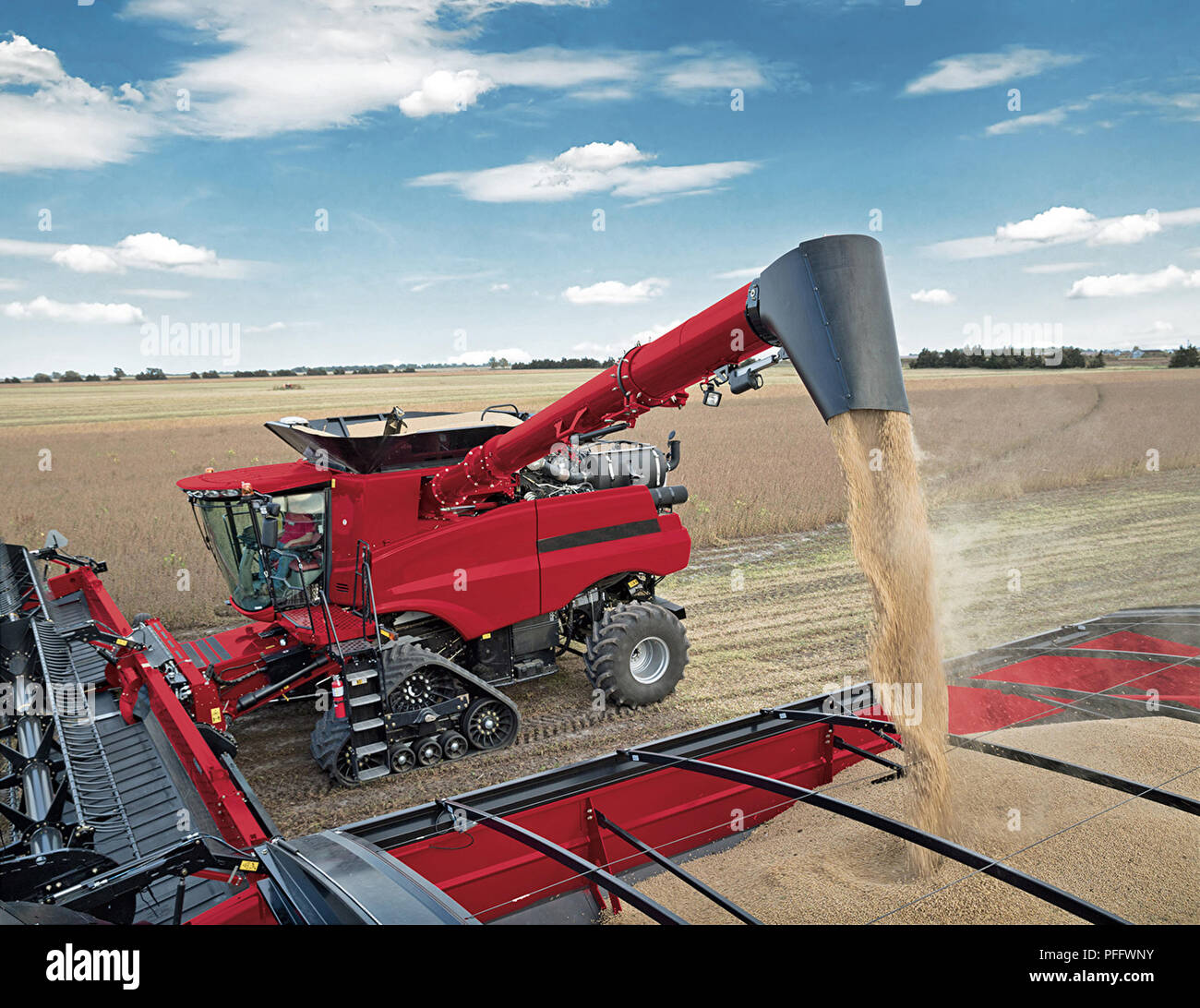 a farmer on the combine harvests wheat Stock Photo - Alamy