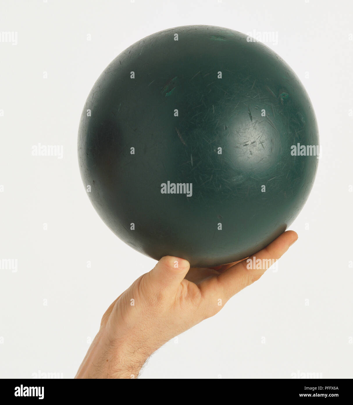 Hand supporting a bowling ball, close up Stock Photo - Alamy