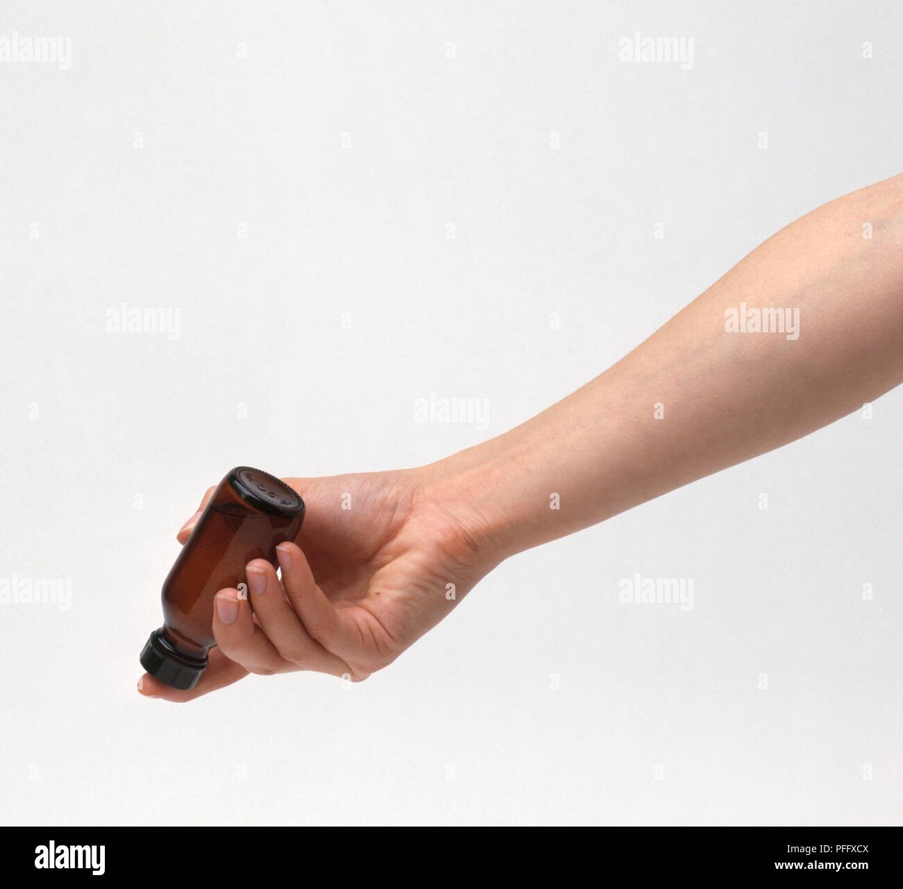 Hand Shaking Bottle Stock Photos & Hand Shaking Bottle Stock Images - Alamy