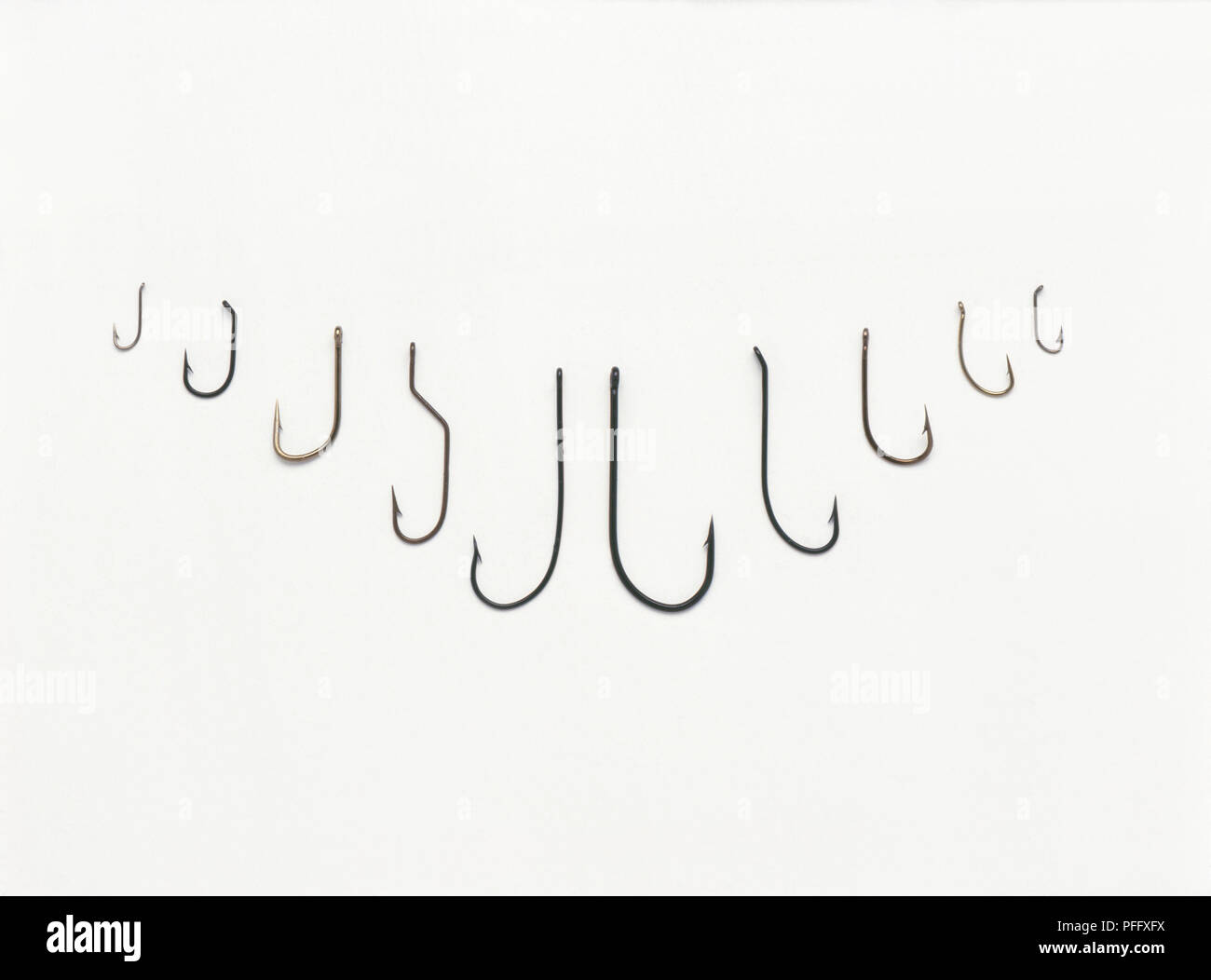 Collection of fishing hooks, close-up Stock Photo - Alamy