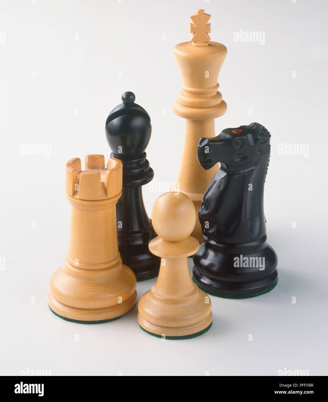 White rook, black bishop, white pawn, white king and black knight chess ...