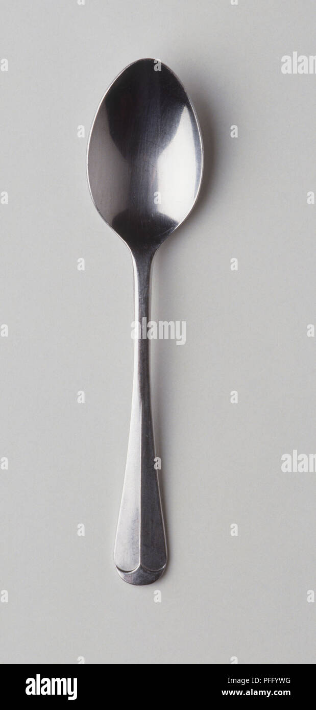 Metal spoon, view from above Stock Photo - Alamy