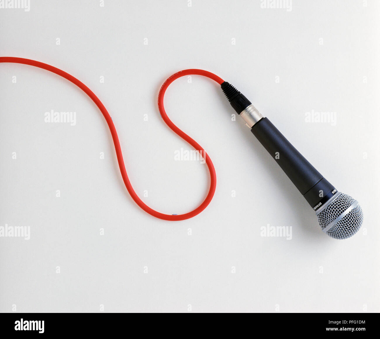 Microphone with a red lead Stock Photo - Alamy