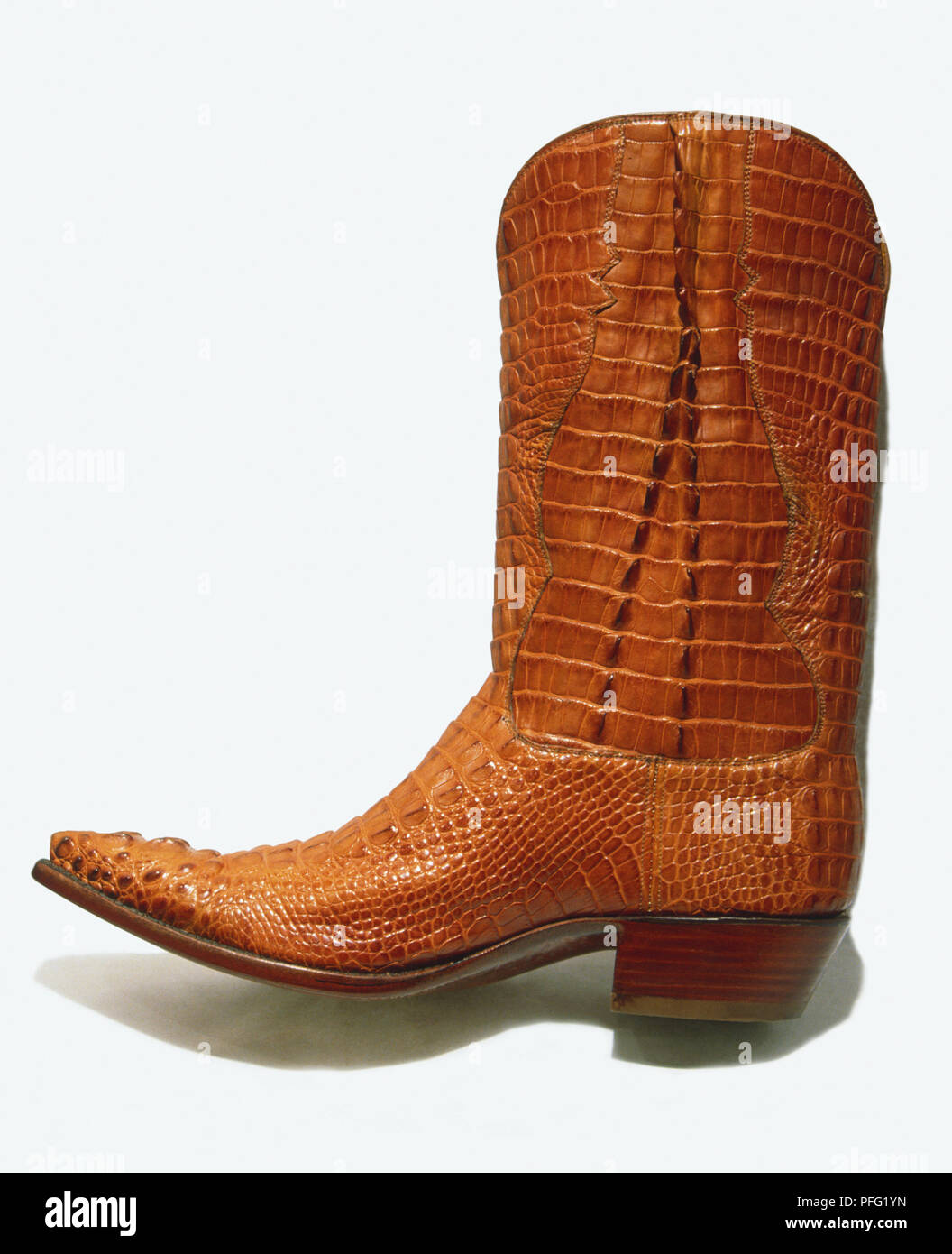 Brown leather cowboy boots, side view Stock Photo - Alamy