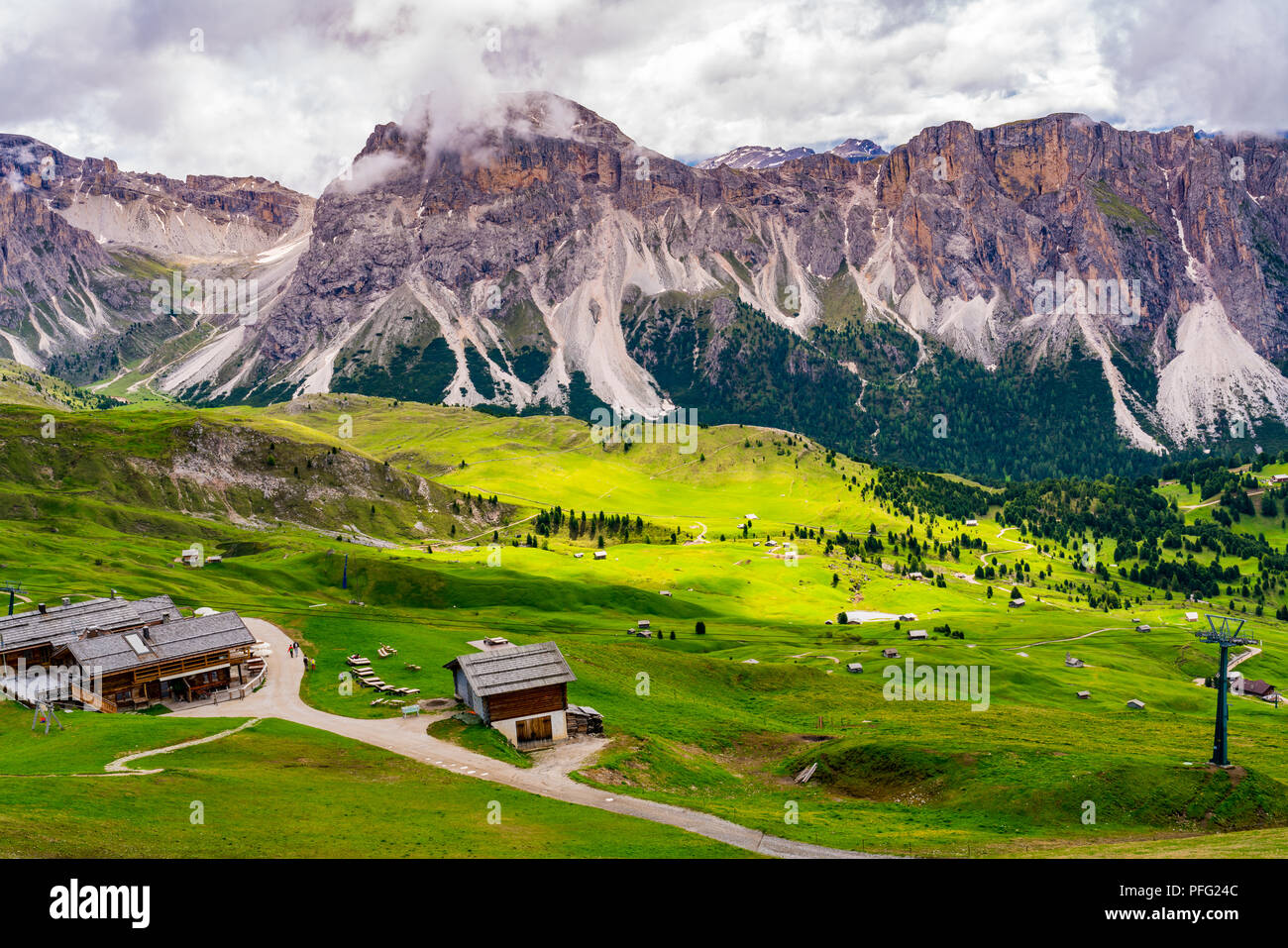 Natural landscape of the Dolomites and the small village at the Secada ...