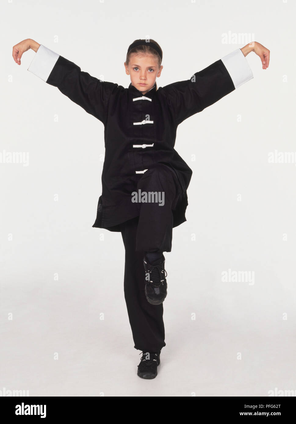 A girl in the crane position Stock Photo - Alamy