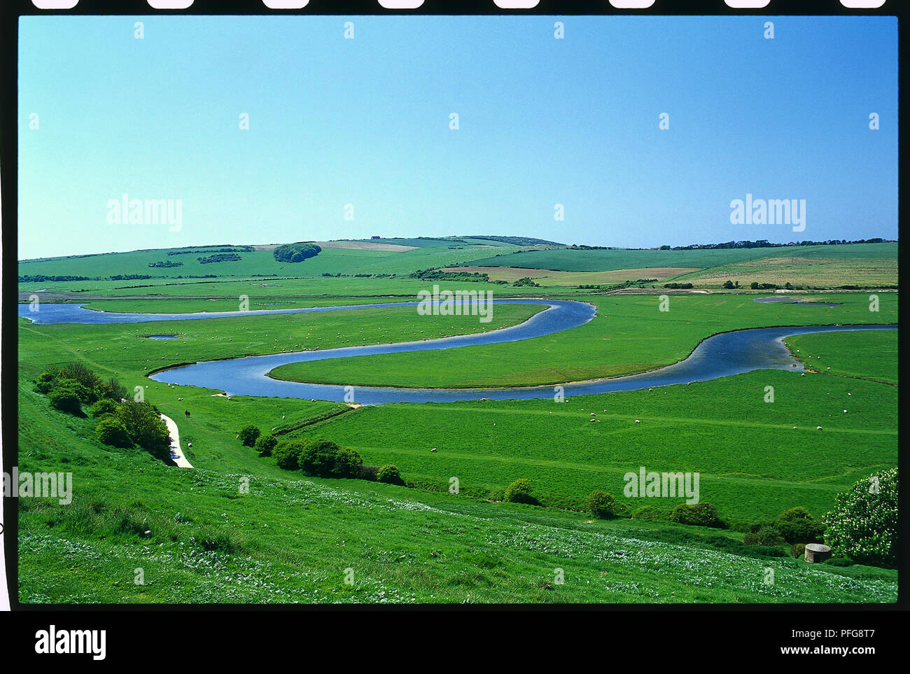 UK, Sussex, meandering River Cuckmere flowing through the South Downs ...