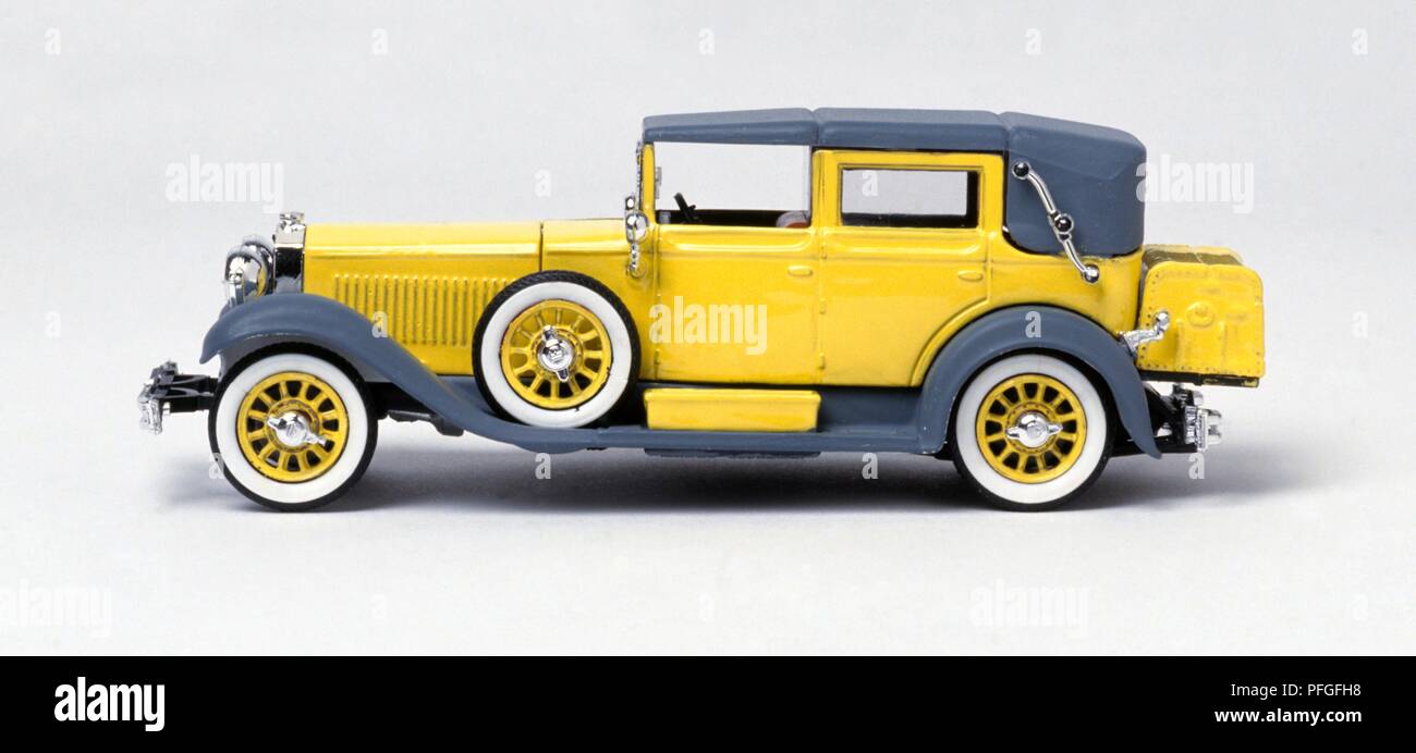 Yellow convertible vintage car, model Stock Photo - Alamy