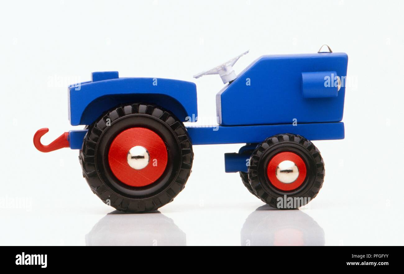 Blue toy tractor hi-res stock photography and images - Alamy