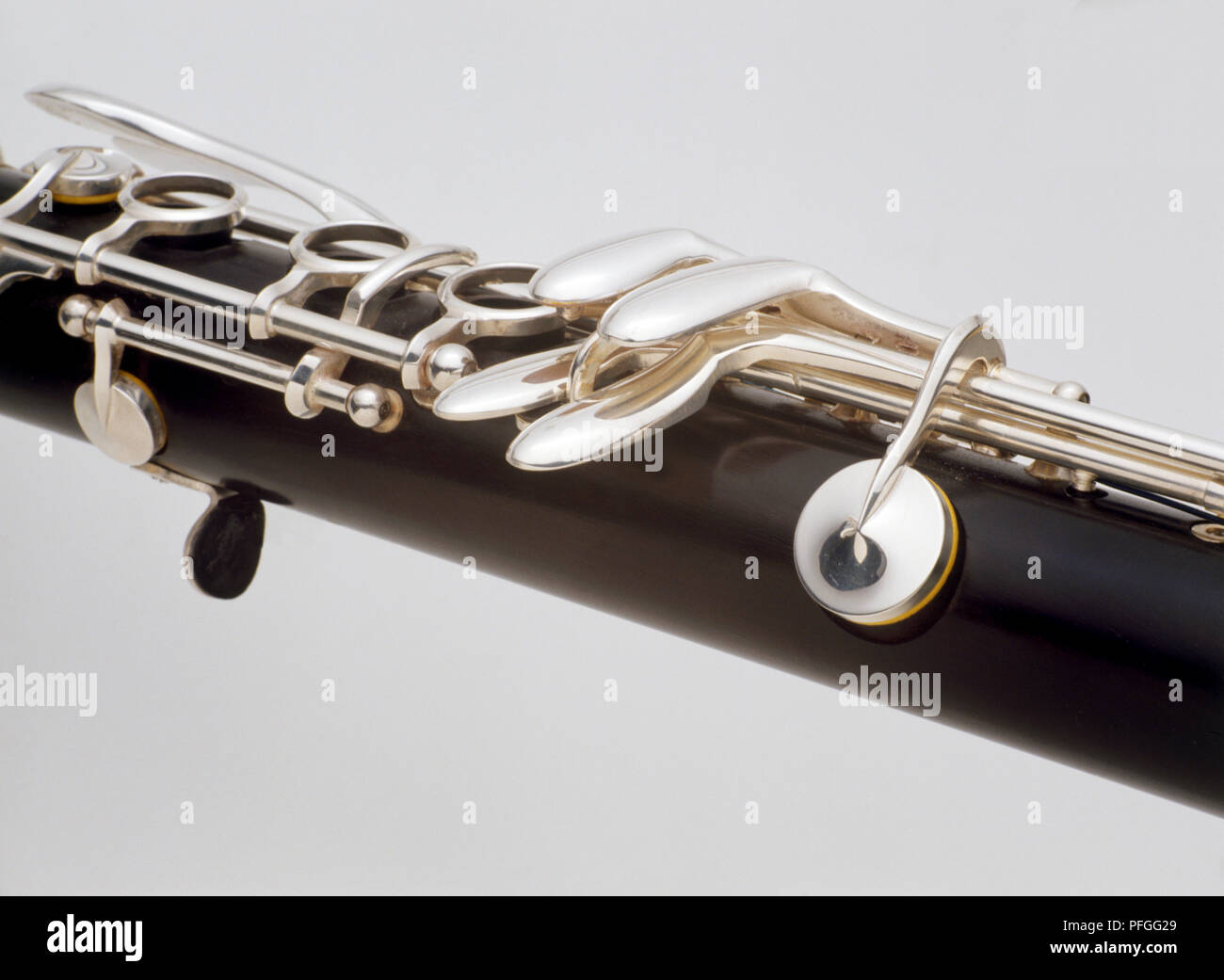 Clarinet, detail of cylindrical wooden tube and keys Stock Photo - Alamy