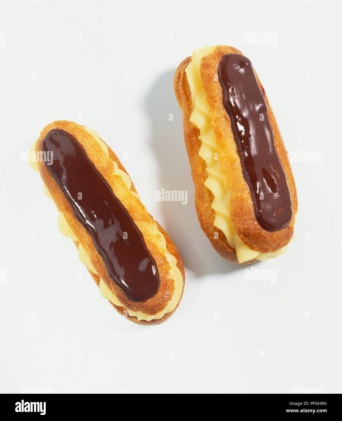 Two Chocolate Eclairs, custard-like patisserie cream filled with plain ...