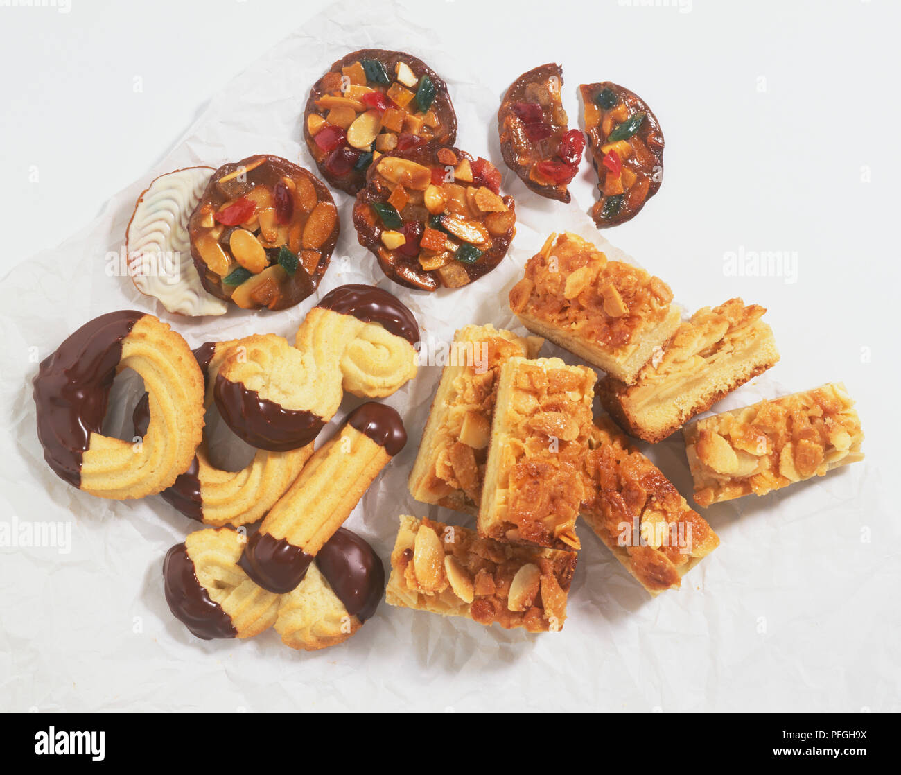 Assortment of biscuits including Florentine biscuits with chocolate ...