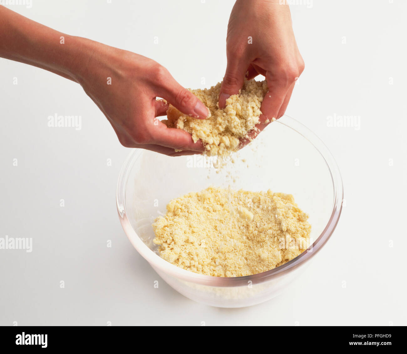 Mixing Butter and Flour Mixture with fingers to make Pastry Stock Photo ...