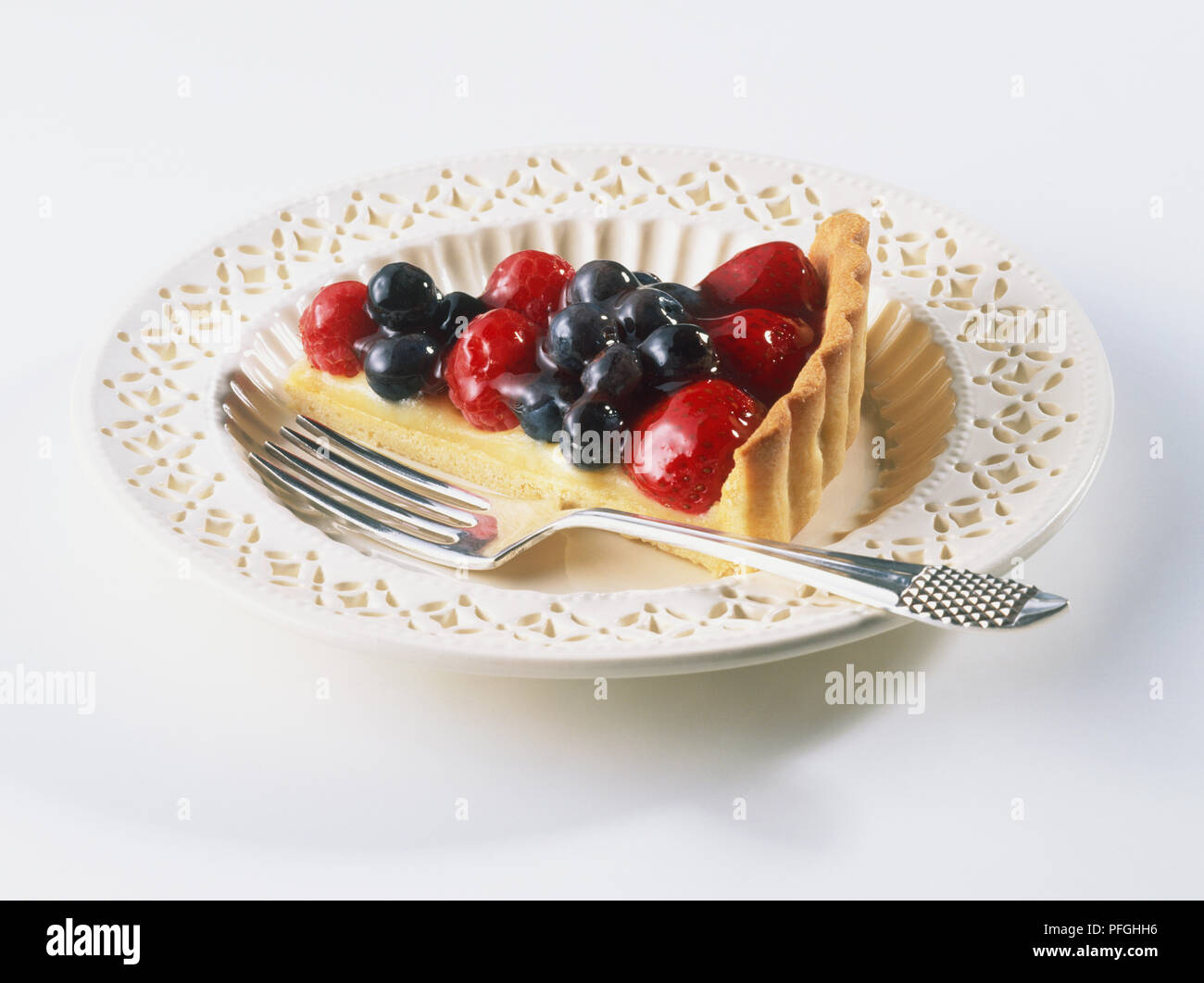 Slice of French Flan with Red Berries Stock Photo - Alamy