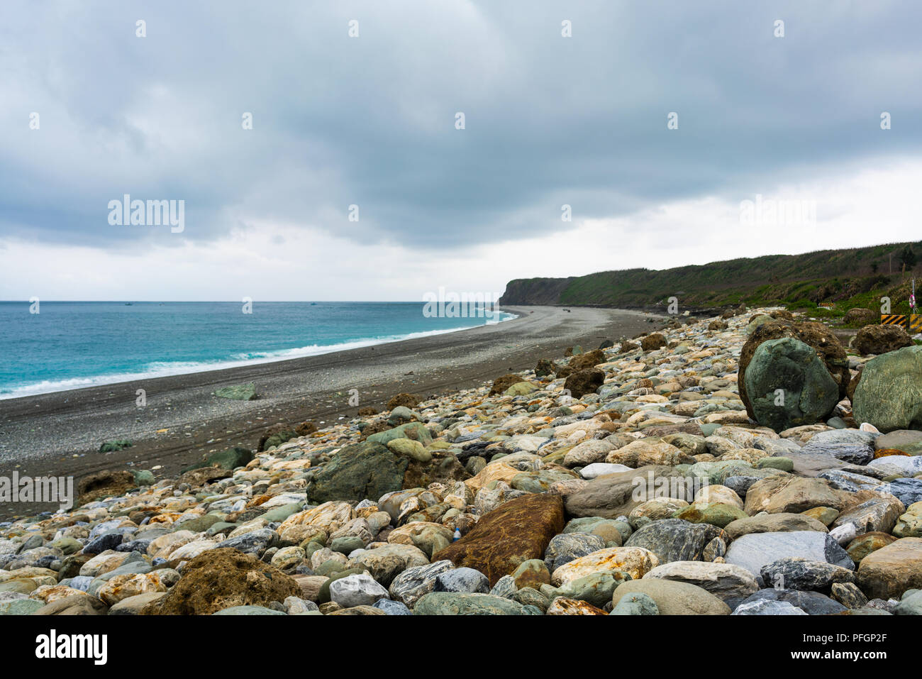 Shingle beach on pacific ocean coast in Qixingtan Scenic Area in ...