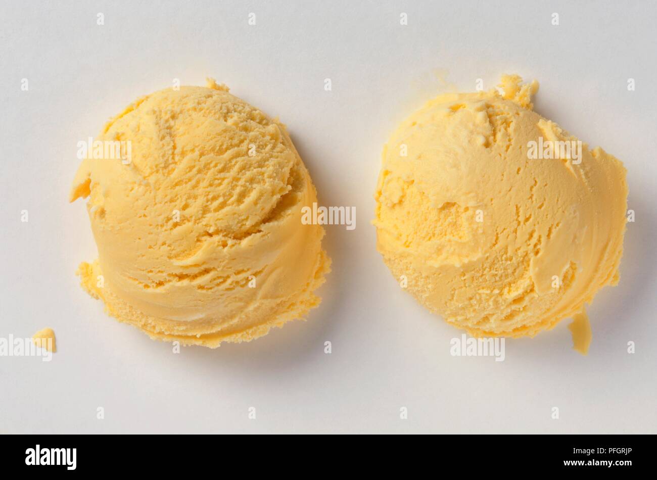 Two scoops of vanilla ice cream Stock Photo - Alamy