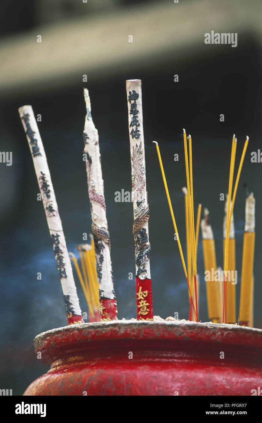 China, Hong Kong, New Kowloon, temple prayer sticks and incense sticks ...