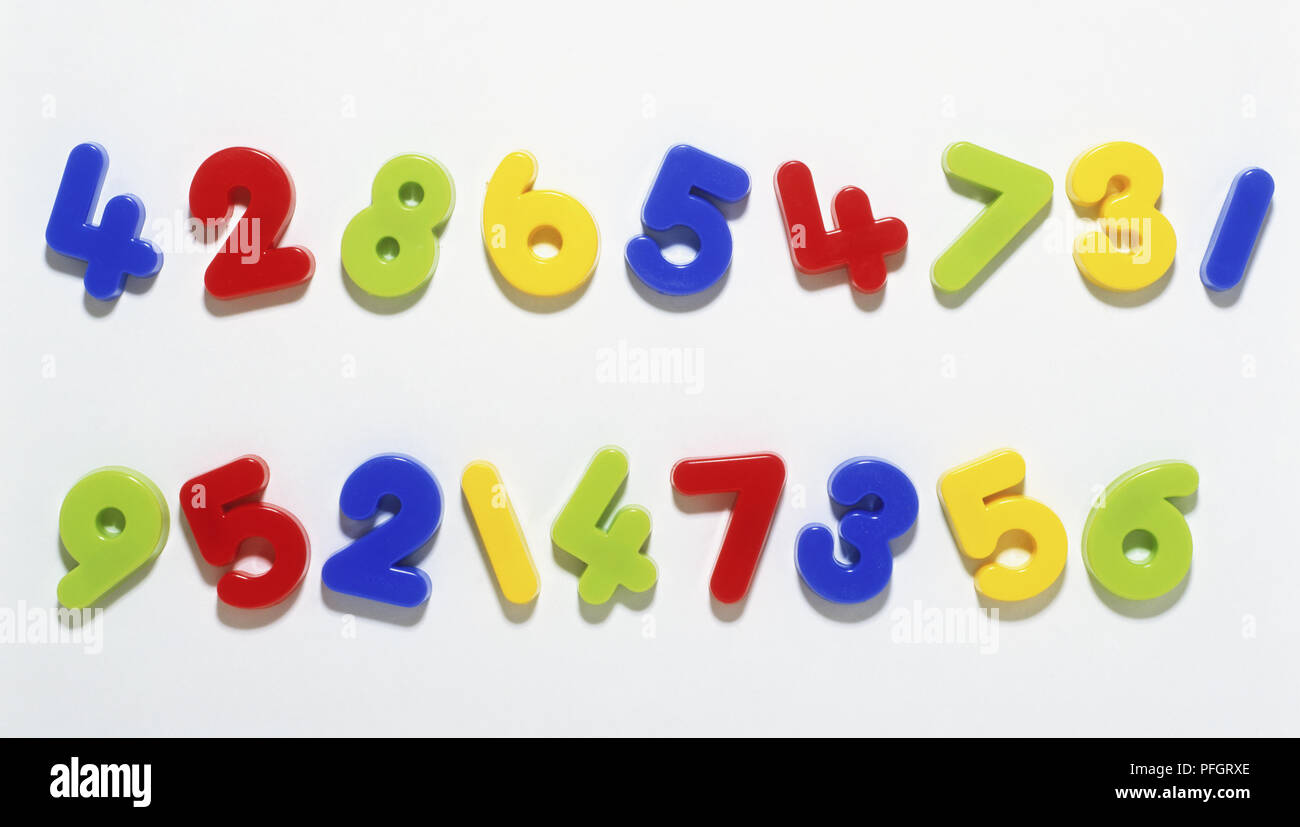 Two rows of colourful plastic numbers Stock Photo - Alamy