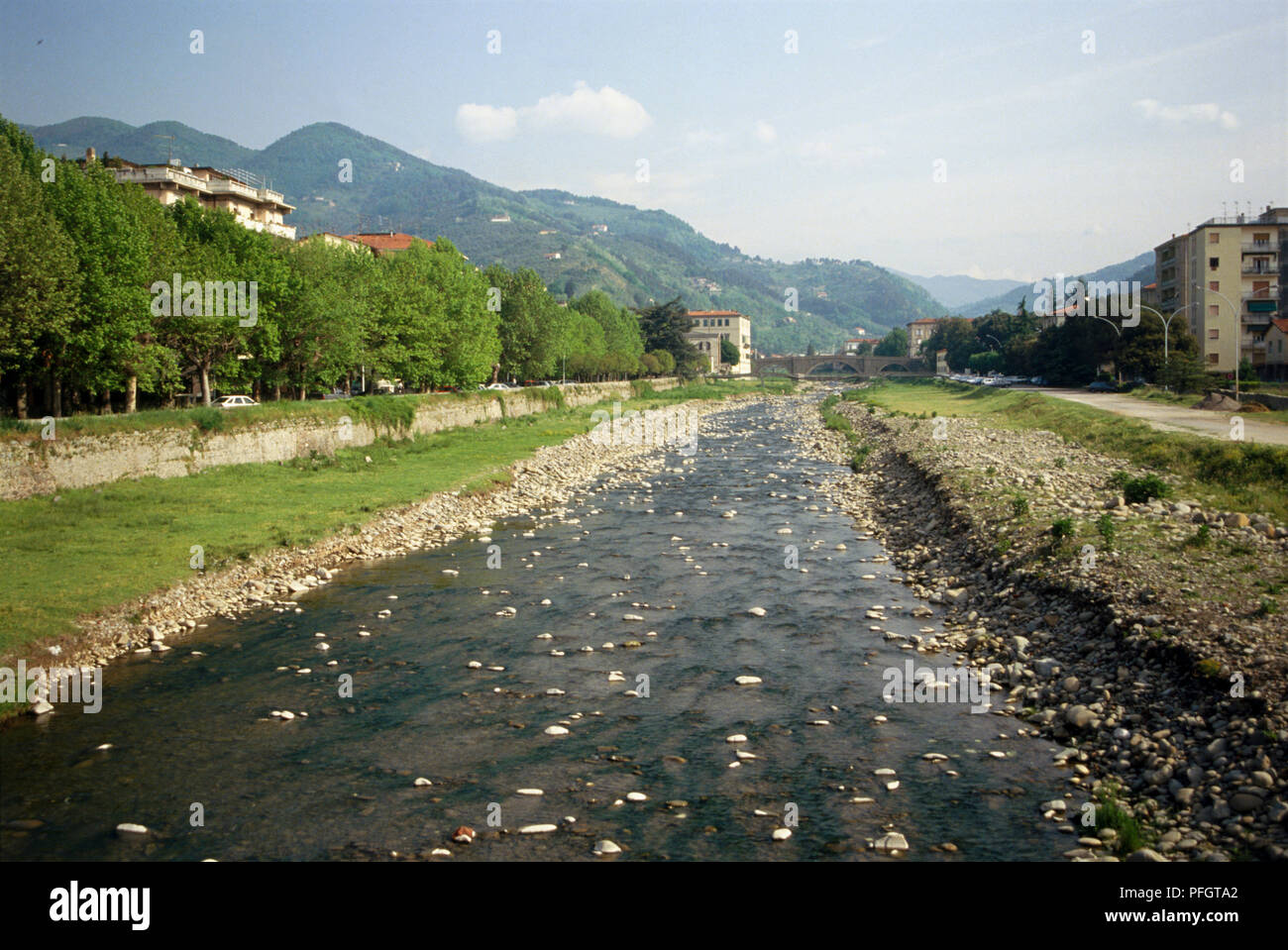 Italy, Tuscany, Pescia river running through fertile, cultivated ...