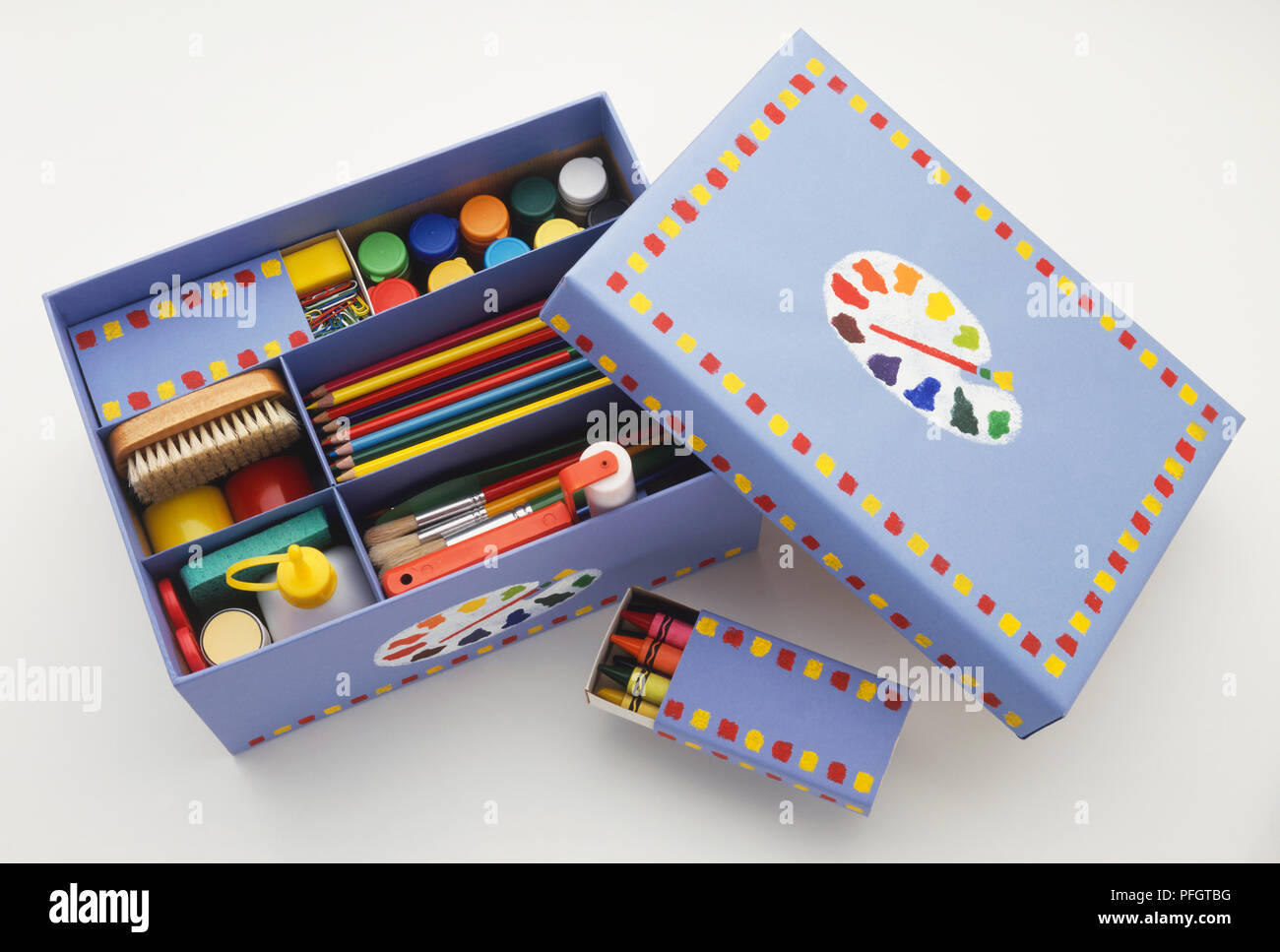 An open blue box that is covered in abstact stencil designs. The ...