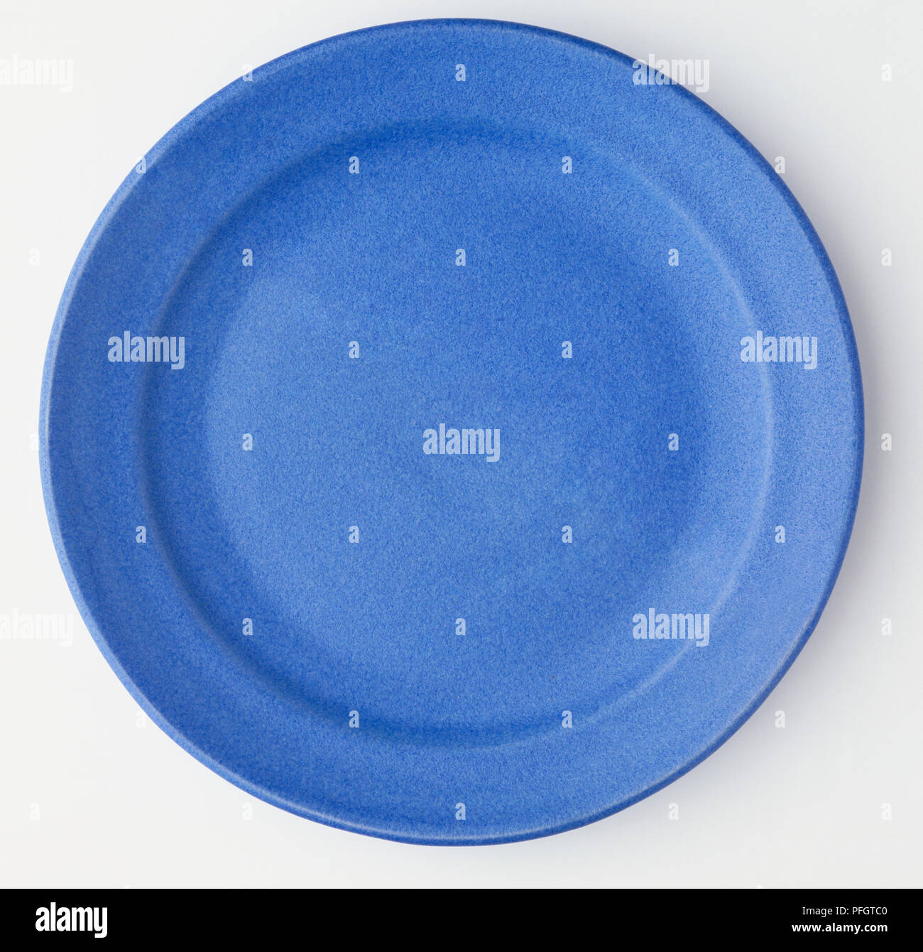 Round blue plate, view from above Stock Photo - Alamy
