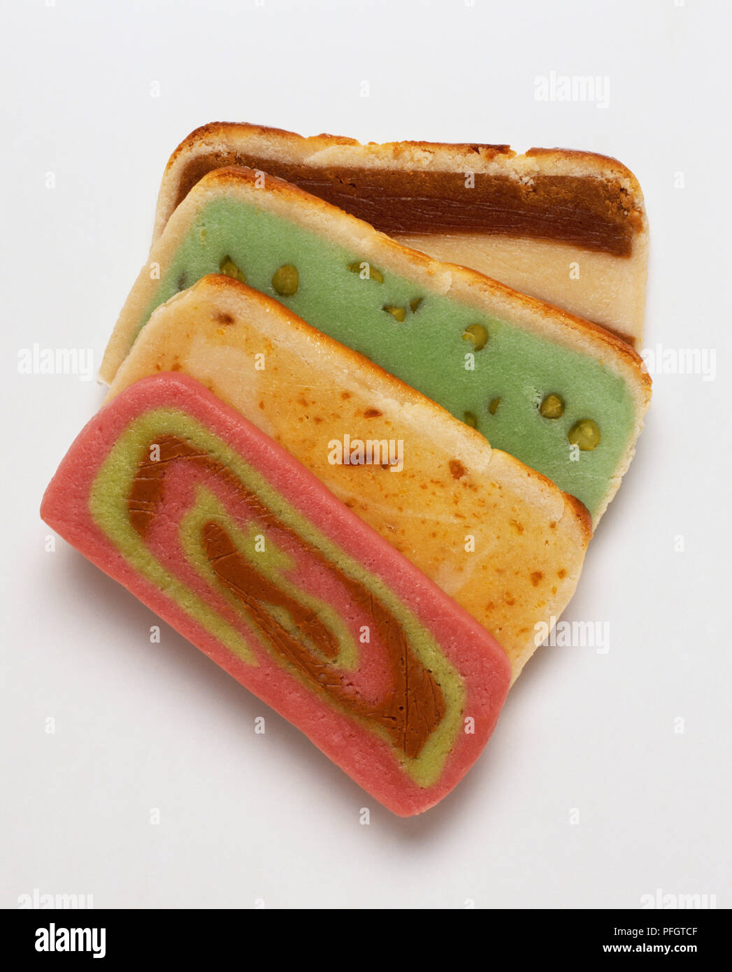 Colourful slices of assorted marzipan loaves Stock Photo - Alamy