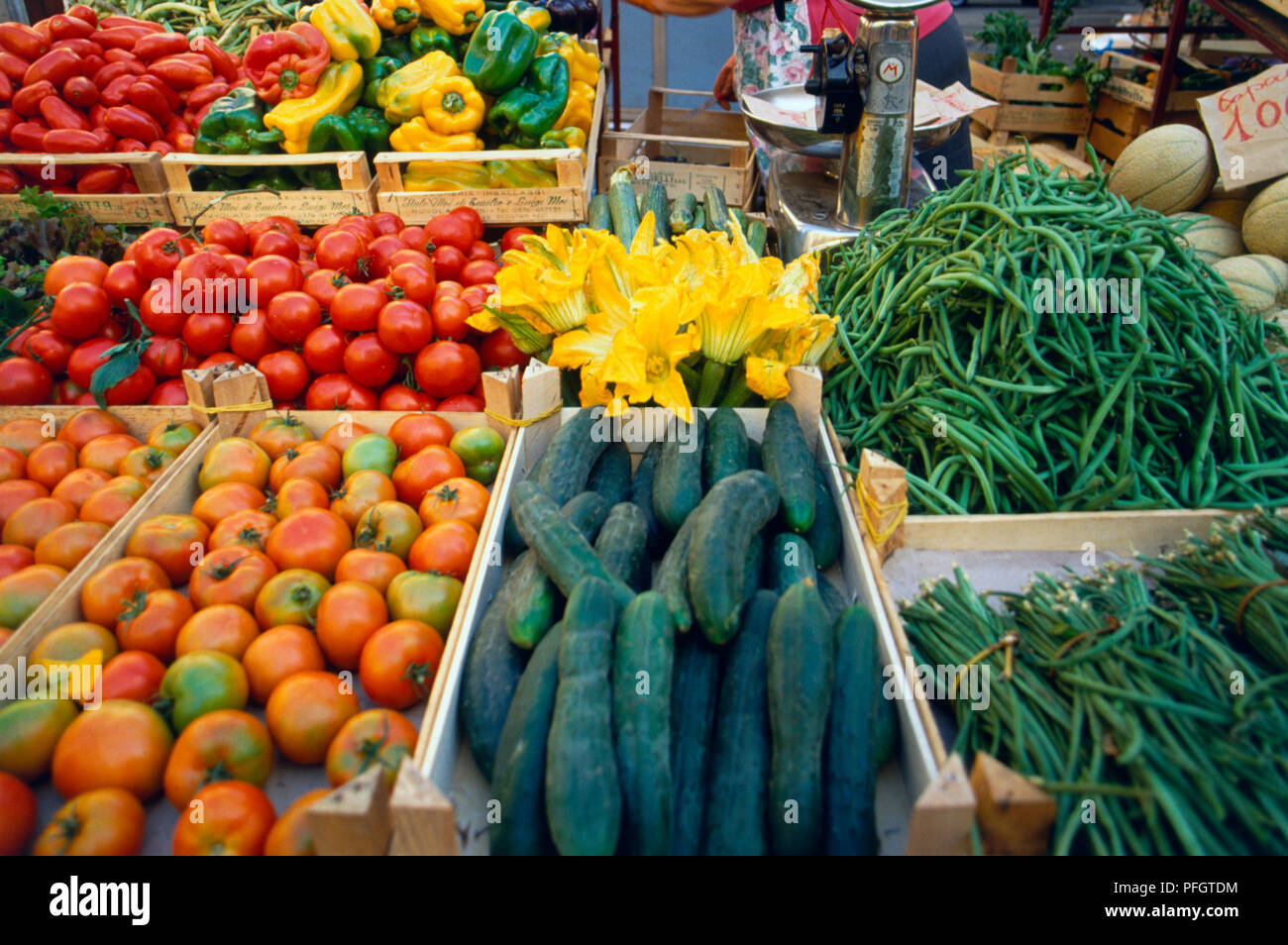 Fresh vegetables in trays on market stall Stock Photo - Alamy