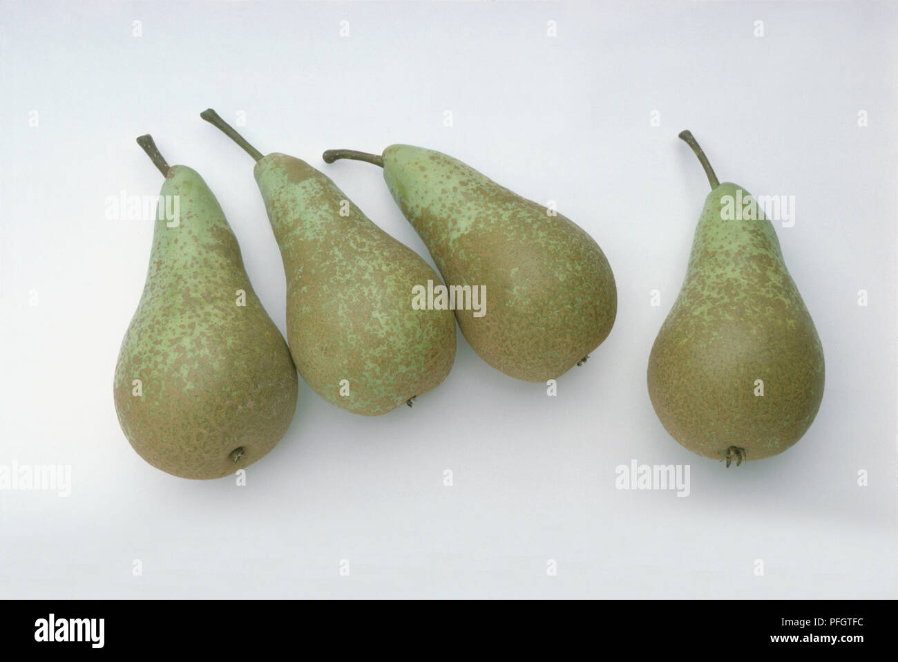 Four 'Conference' pears, close-up Stock Photo - Alamy
