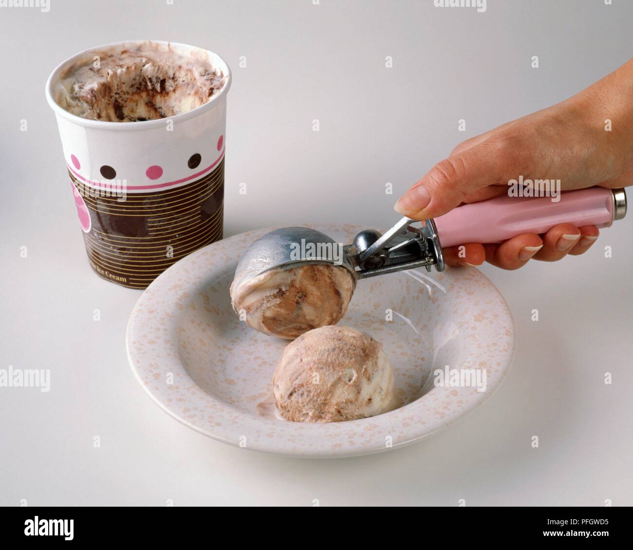 Hand Scooping Ice Cream